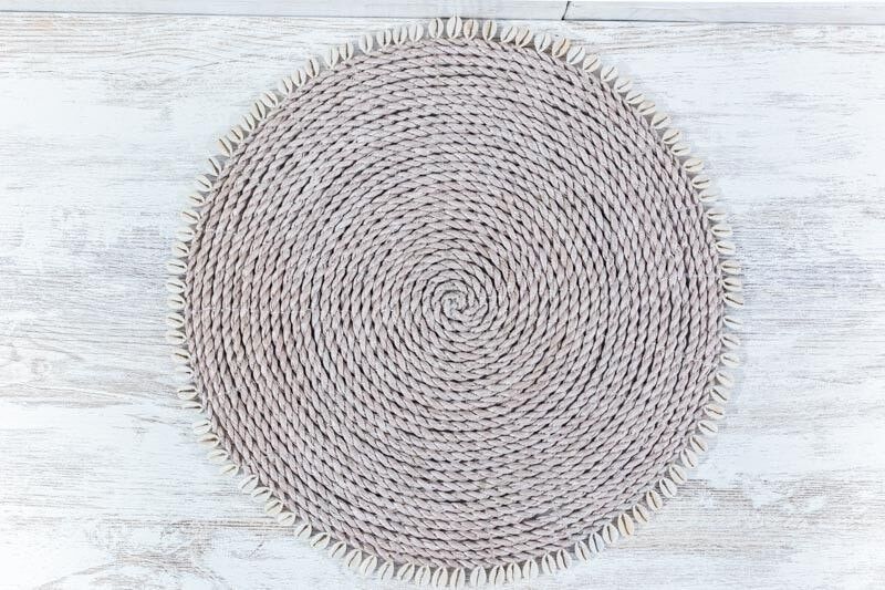 Buy wholesale Raffia and worn pink shell individual tablecloth.