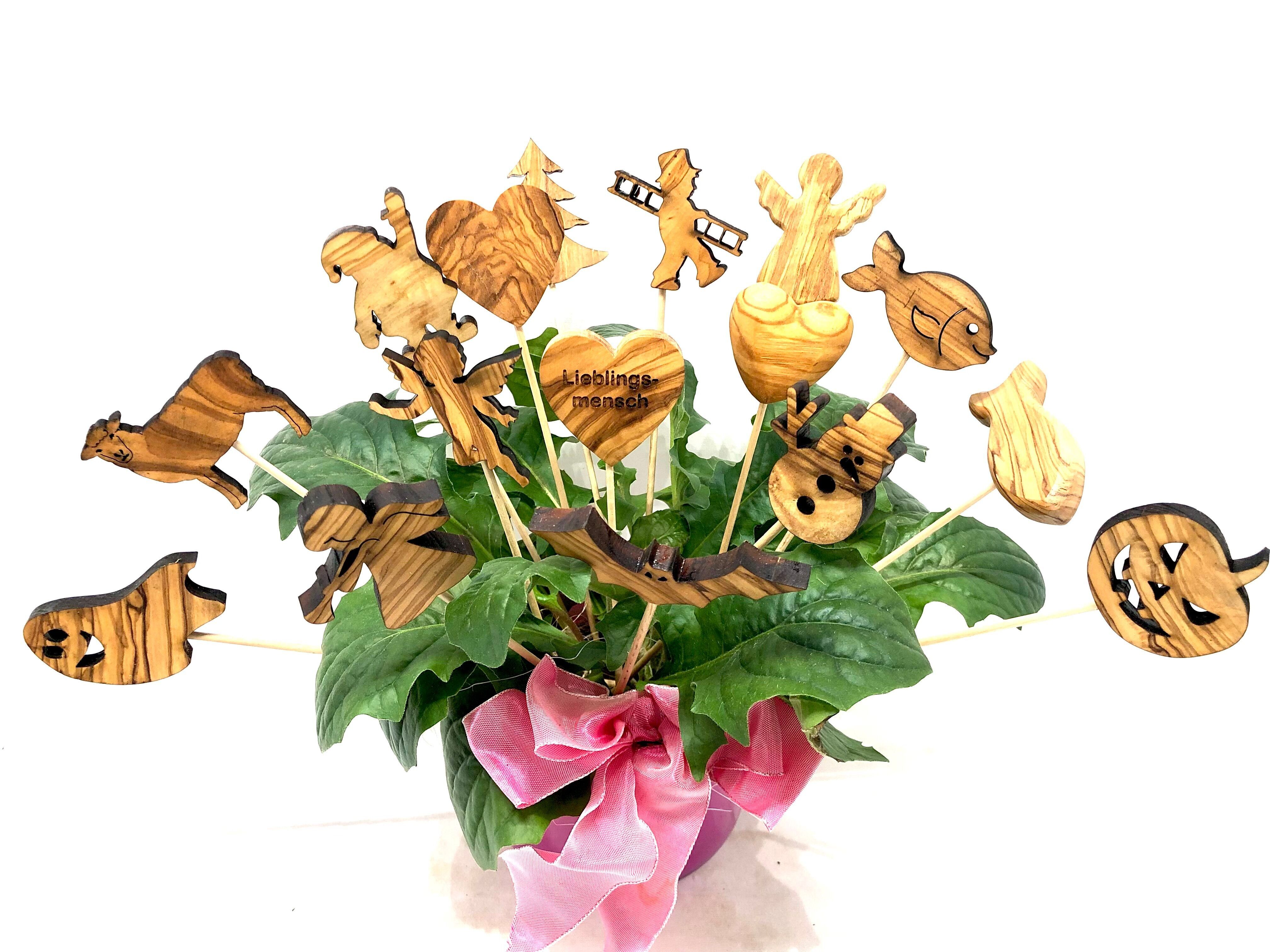Buy wholesale Flower plug fish or heart as a thank you made of olive wood