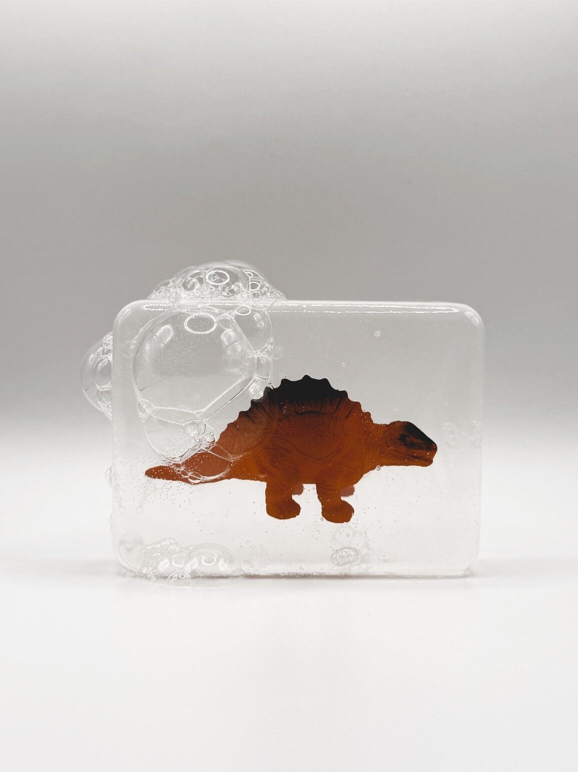 Achat Savon Transparent Artisanal avec Dinosaure Stegosaurus en gros
